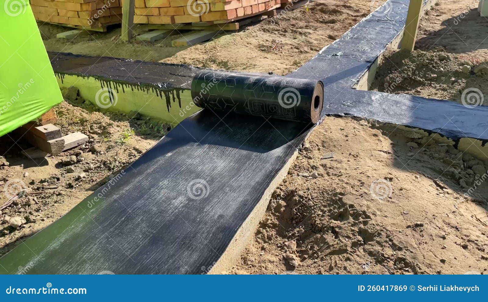 Construction Work on Waterproofing the Foundation. Roll Waterproofing ...