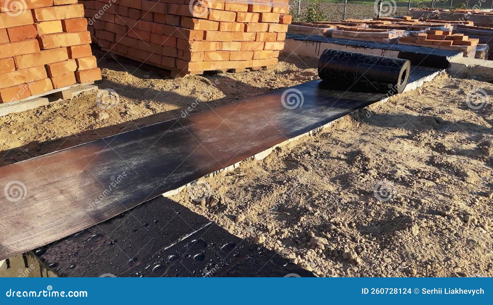 Construction Work on Waterproofing the Foundation. Roll Waterproofing ...