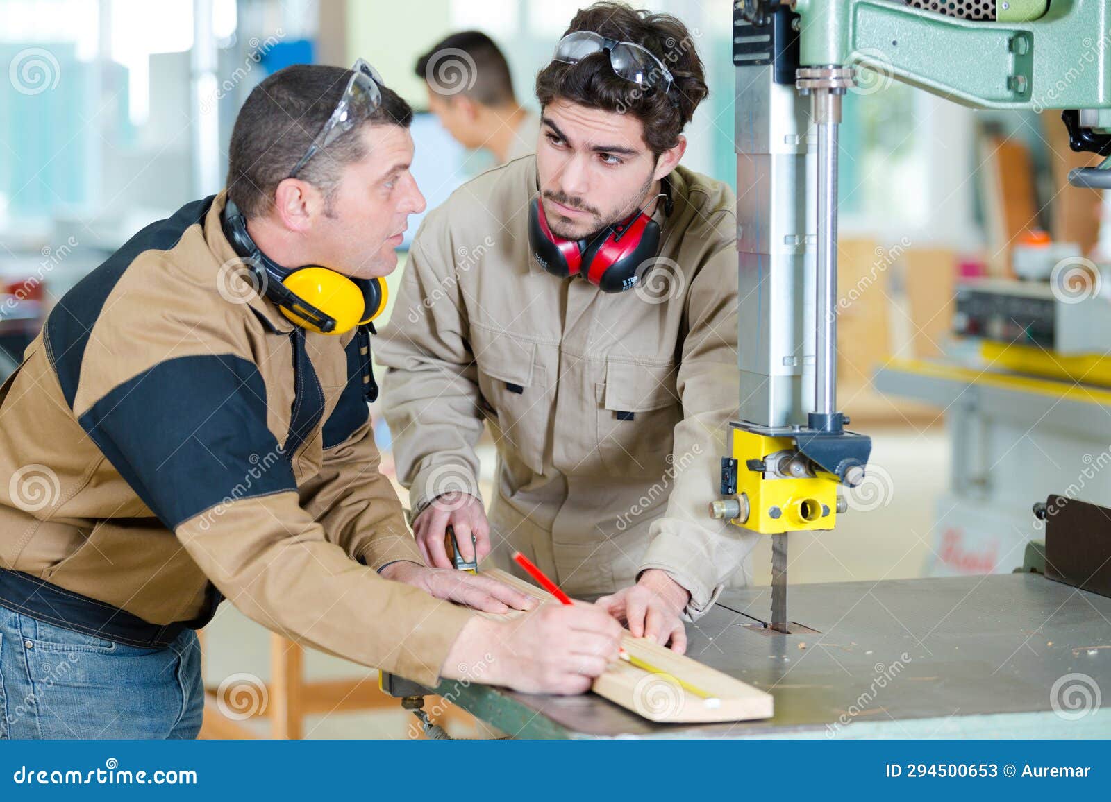 Construction Worker and Apprentice in Workshop Stock Image - Image of ...