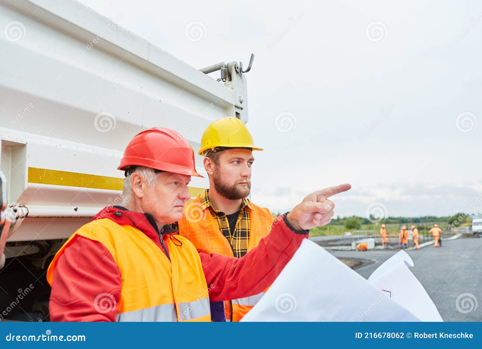 Construction Worker and Architect with Architectural Drawing Stock ...