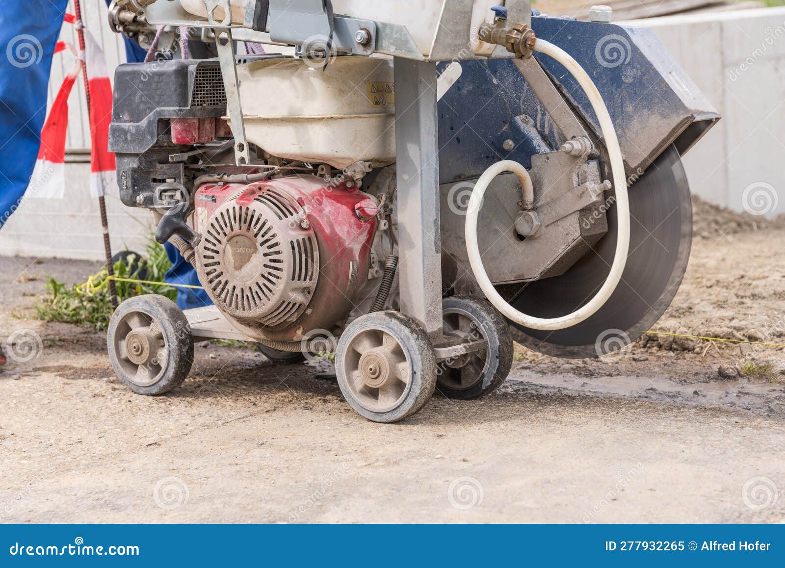 Construction Worker with Asphalt Cutting Machine Stock Image - Image of ...