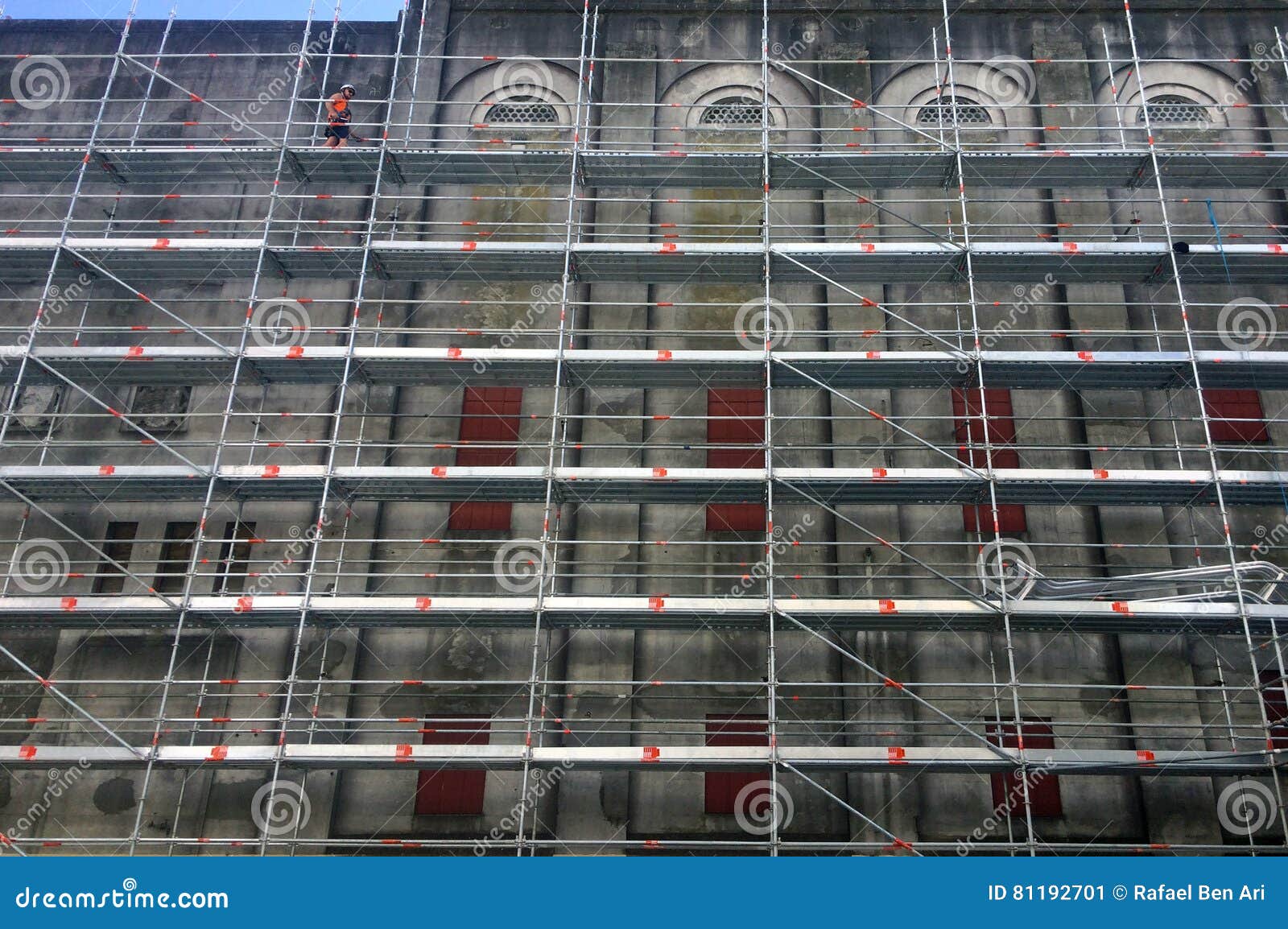 Construction Worker Assemble Scaffolding on a Building Site Editorial ...
