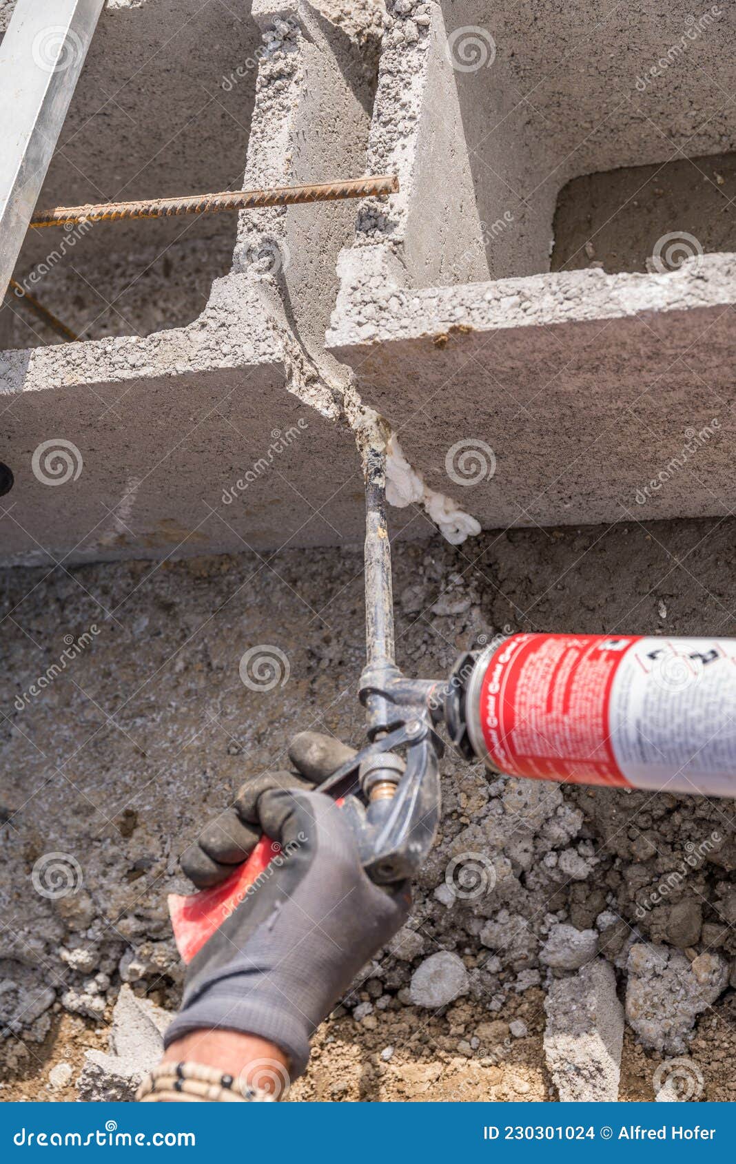Construction Worker with Assembly Foam Stock Photo - Image of builders ...