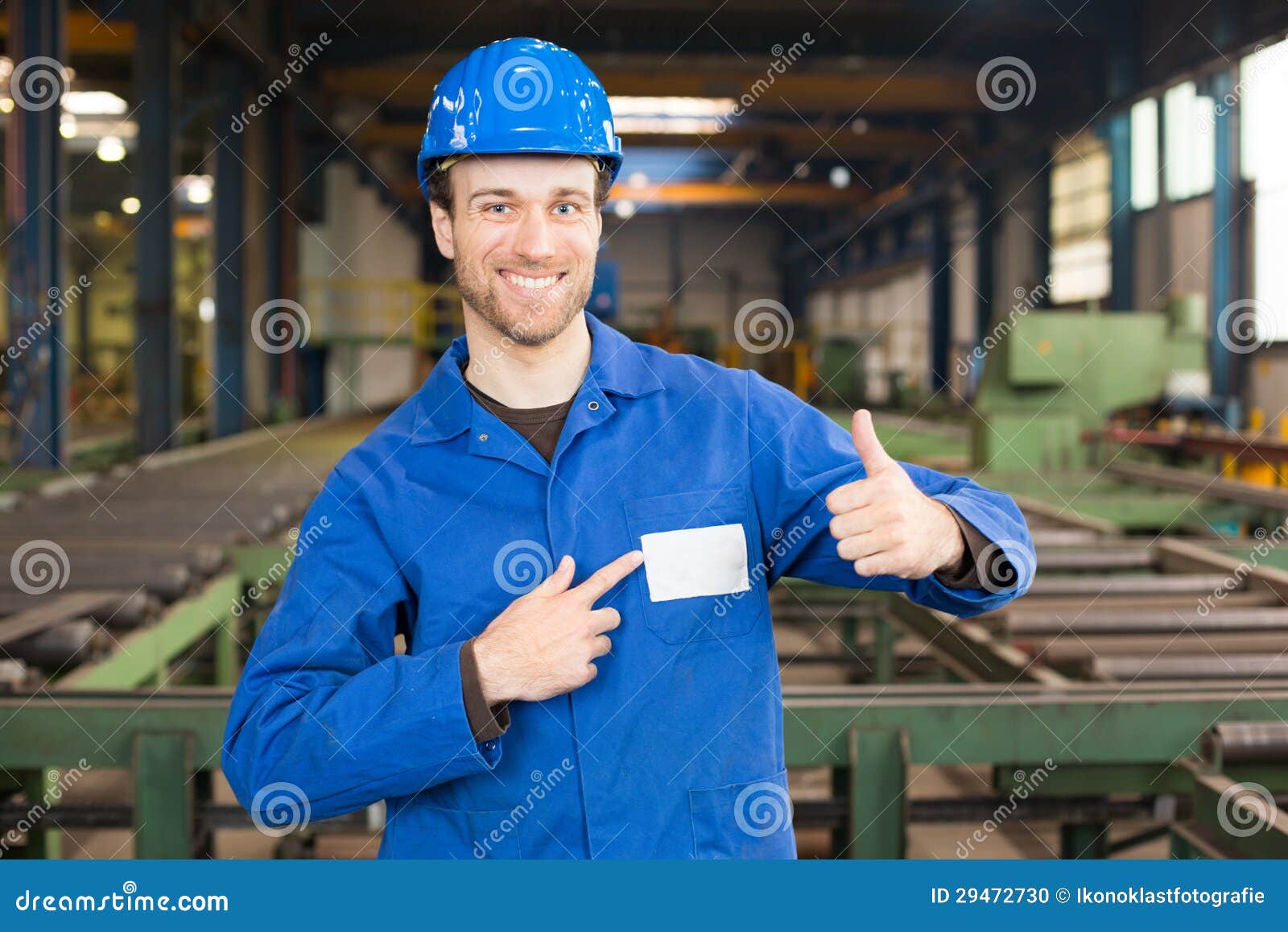 Construction Worker in Assembly Hall Stock Photo - Image of handsome ...