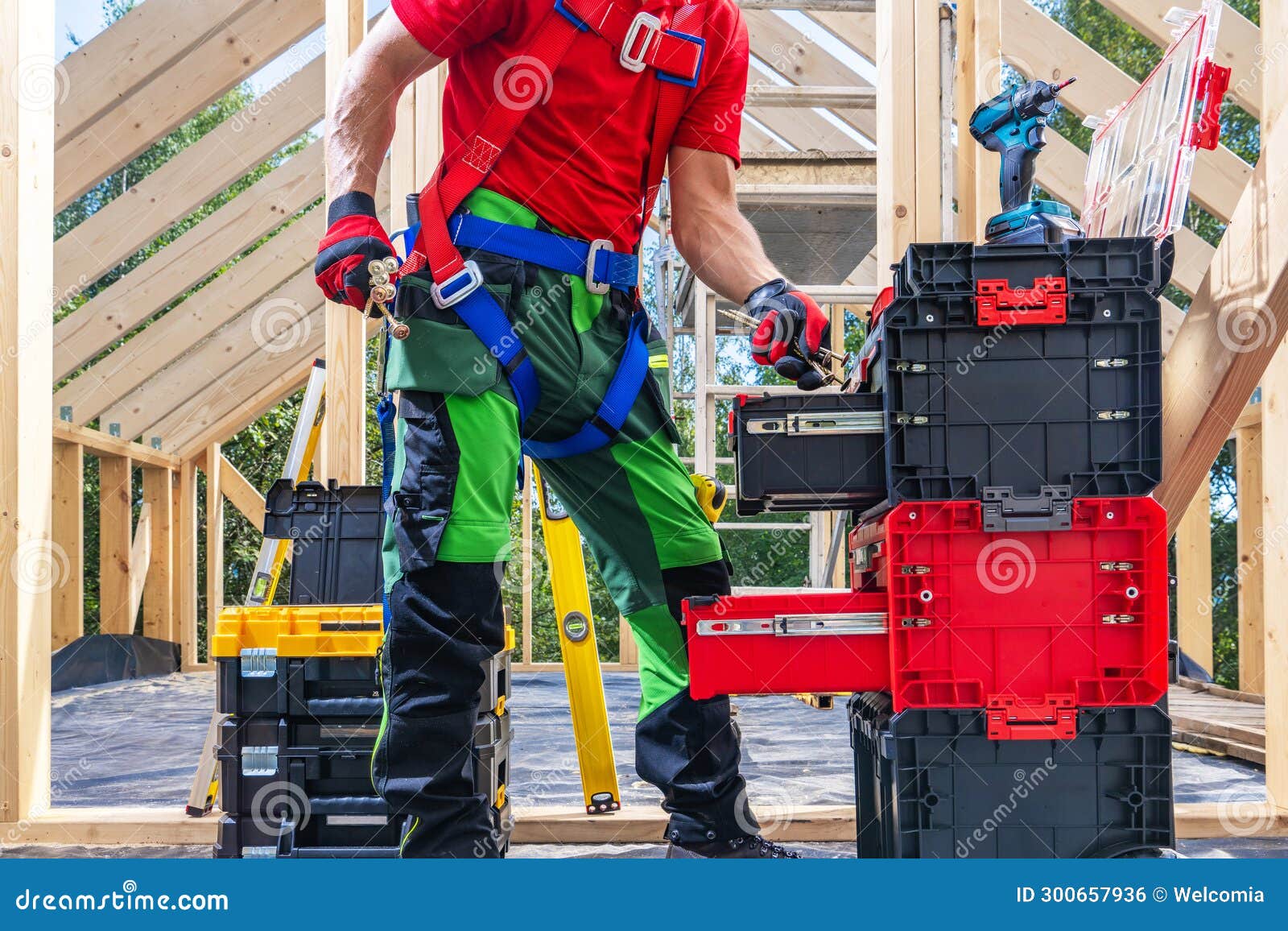 Construction Worker and Big Pile of His Tools and Equipment Stock Photo ...
