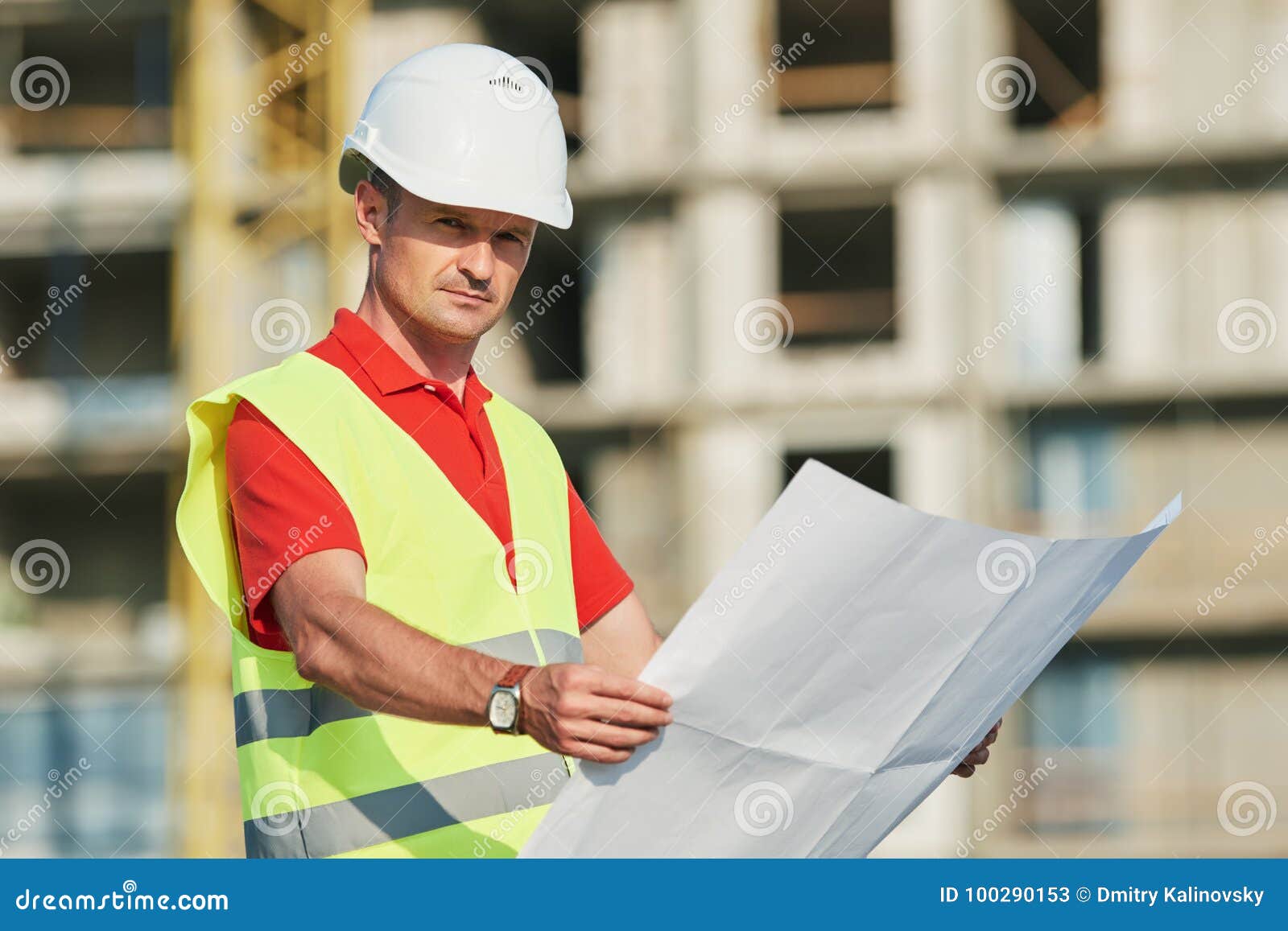 Construction Worker with Blueprint at Building Area Stock Image - Image ...
