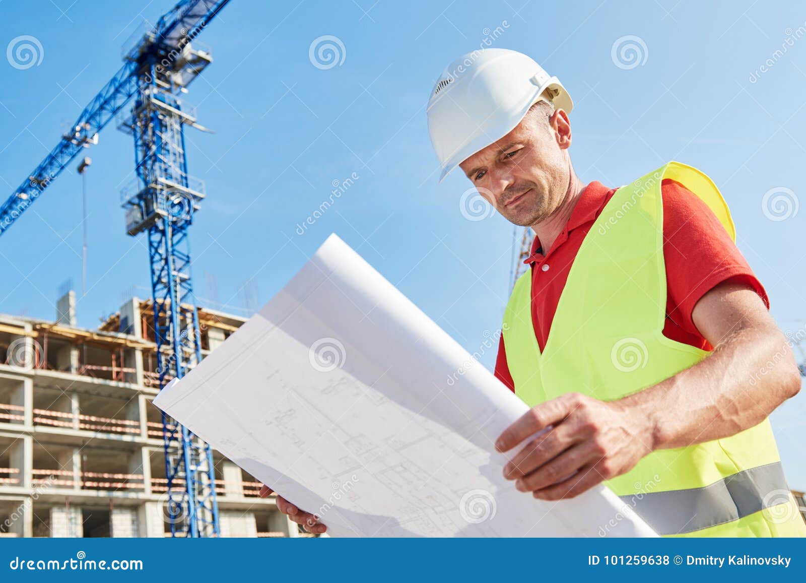 Construction Worker with Blueprint at Building Area Stock Photo - Image ...
