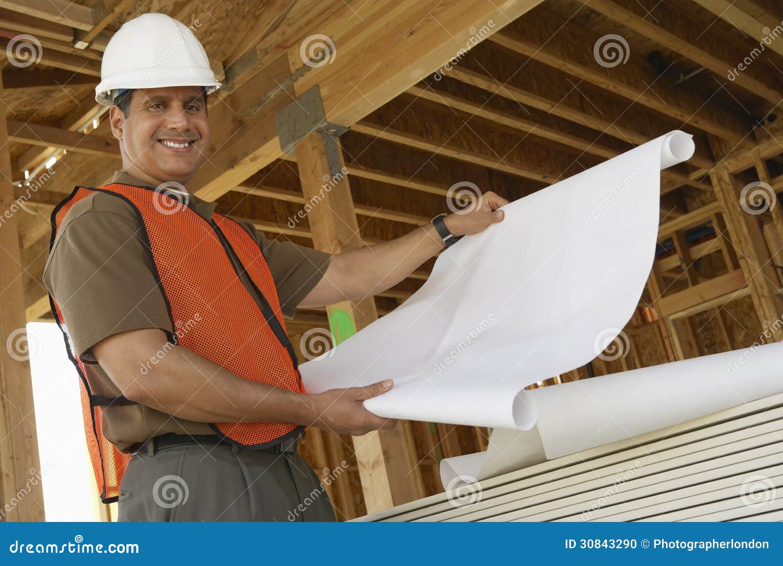 Construction Worker with Blueprints Stock Photo - Image of hardhat ...