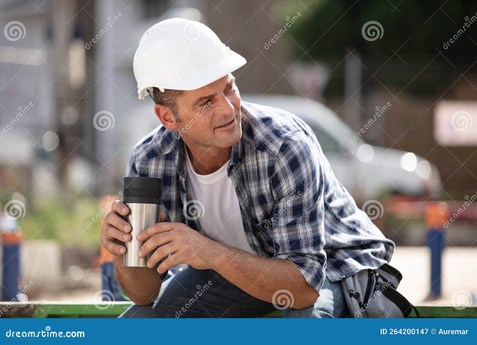 Construction Worker on Break Holding Coffee in Insulated Cup Stock ...