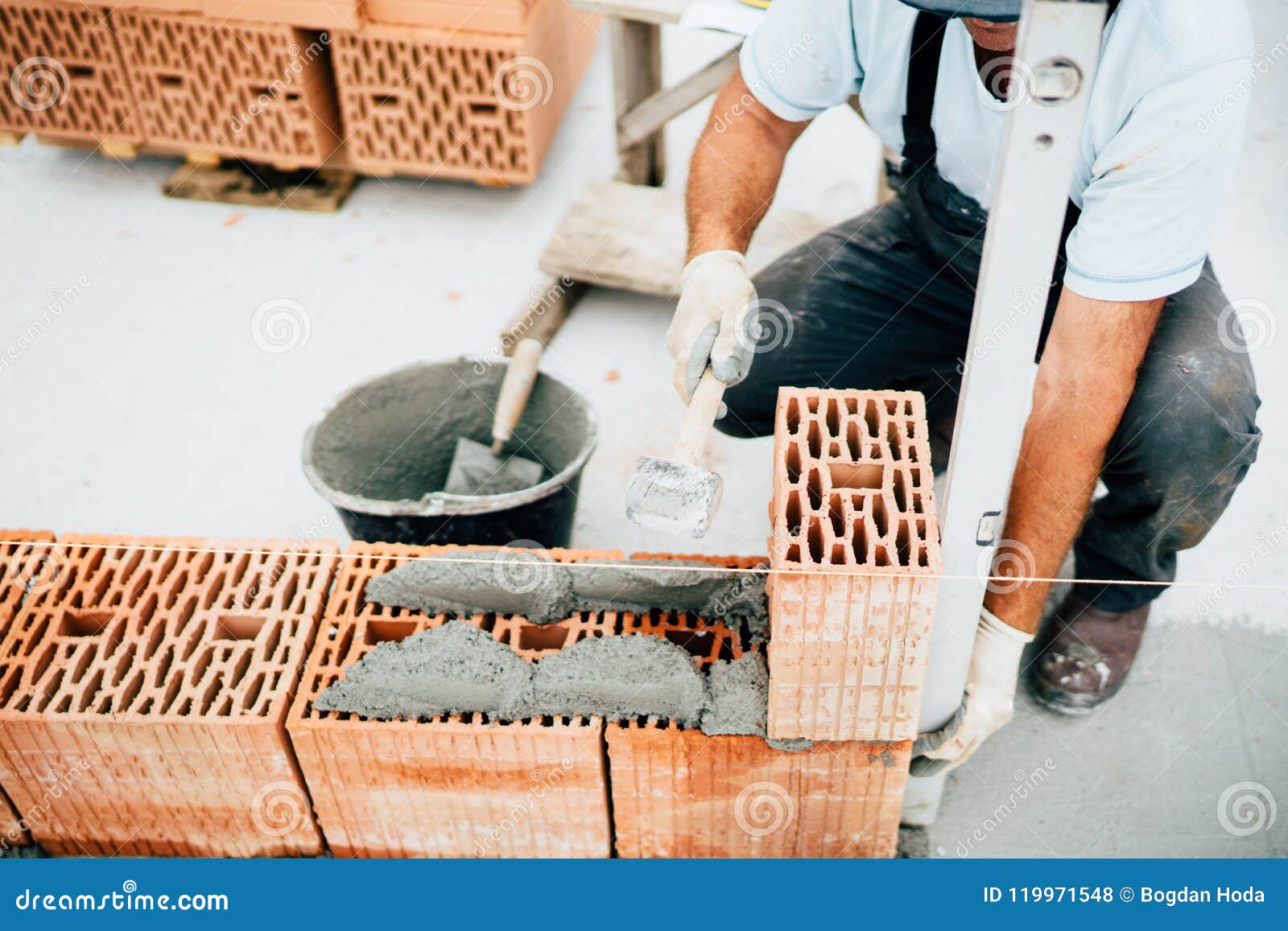 Industrial Worker, Bricklayer and Mason Working with Bricks and ...