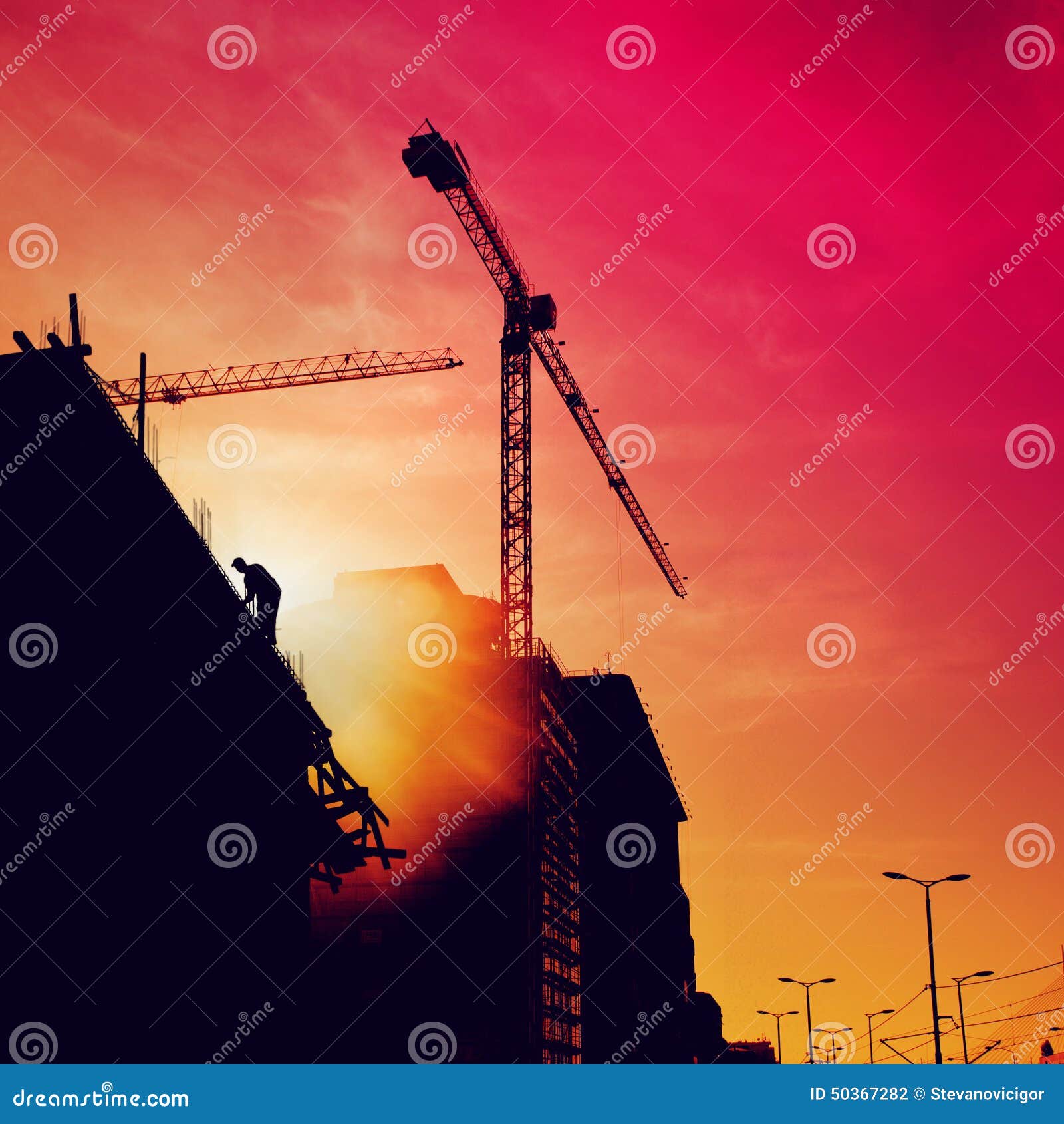 Construction Worker on a Building in Sunset Stock Photo - Image of late ...