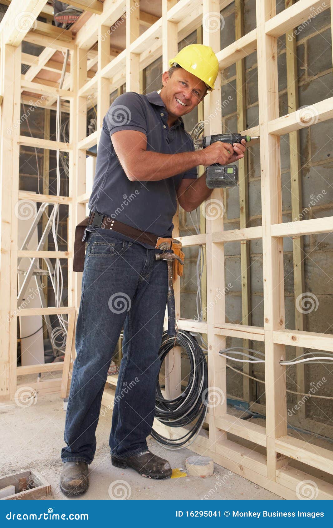 Worker Building Exterior Walls, Using Hammer For Laying Bricks In ...