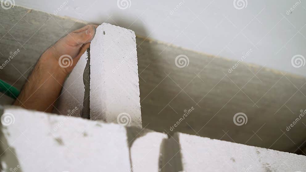 Construction Worker Building a Wall with Bricks. Stock Image - Image of ...