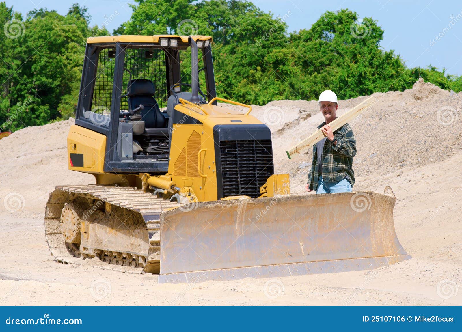 Construction Worker and Bulldozer Stock Photo - Image of improve, homes ...