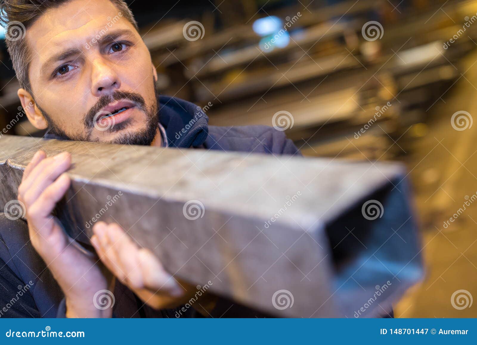 Construction Worker Carrying Reinforcement Rods Stock Image - Image of ...