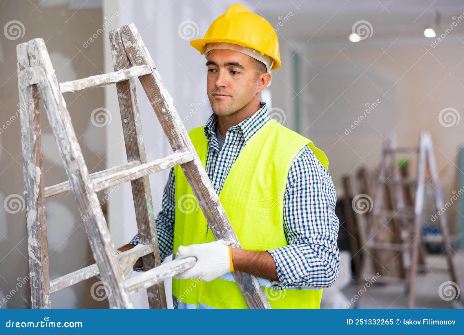 Construction Worker Carrying Stepladder in Apartment Stock Image ...
