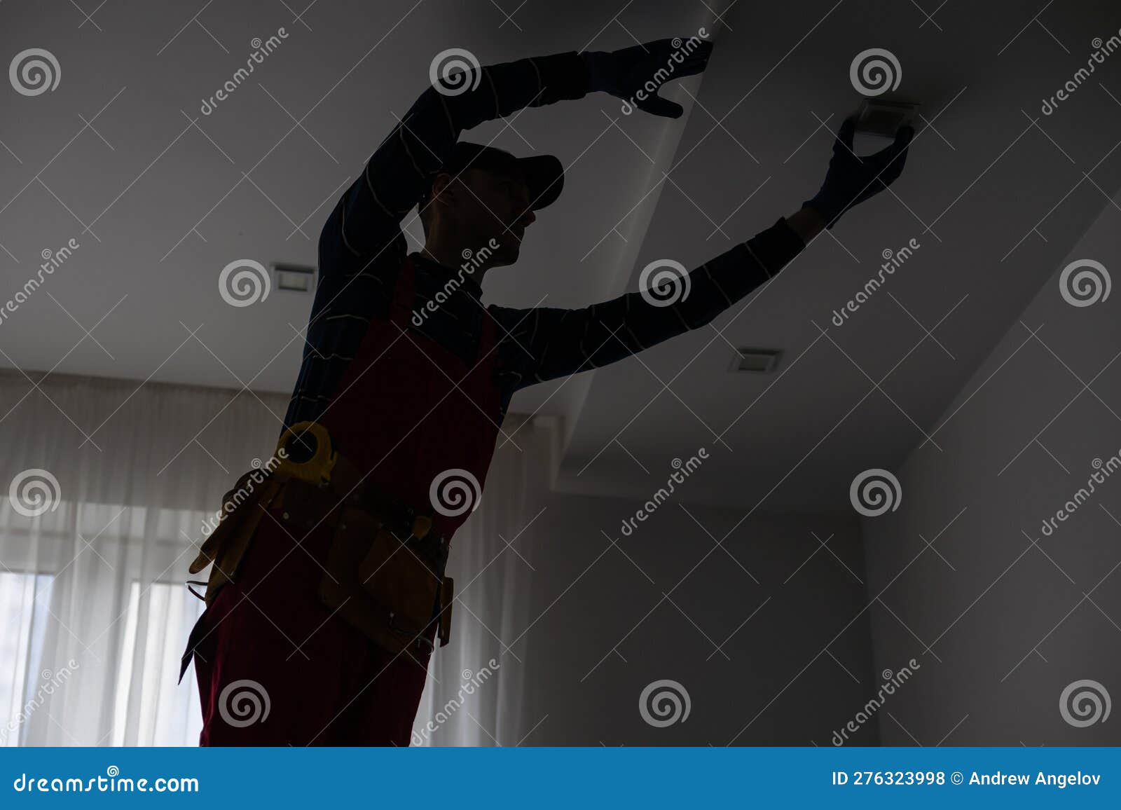 Construction Worker Ceiling Work. Working on Repairs Stock Photo ...