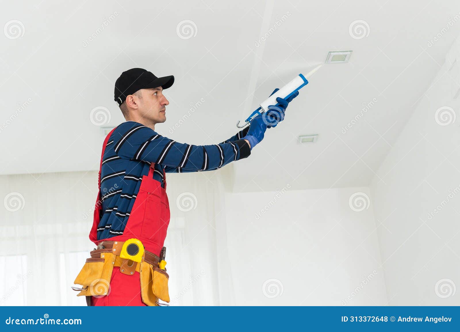 Construction Worker Ceiling Work. Working on Repairs Stock Photo ...