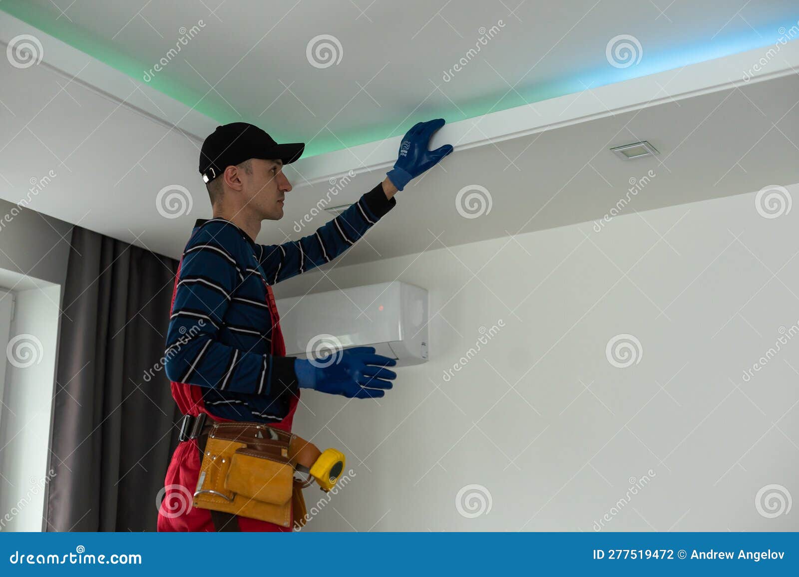 Construction Worker Ceiling Work. Working on Repairs Stock Photo ...