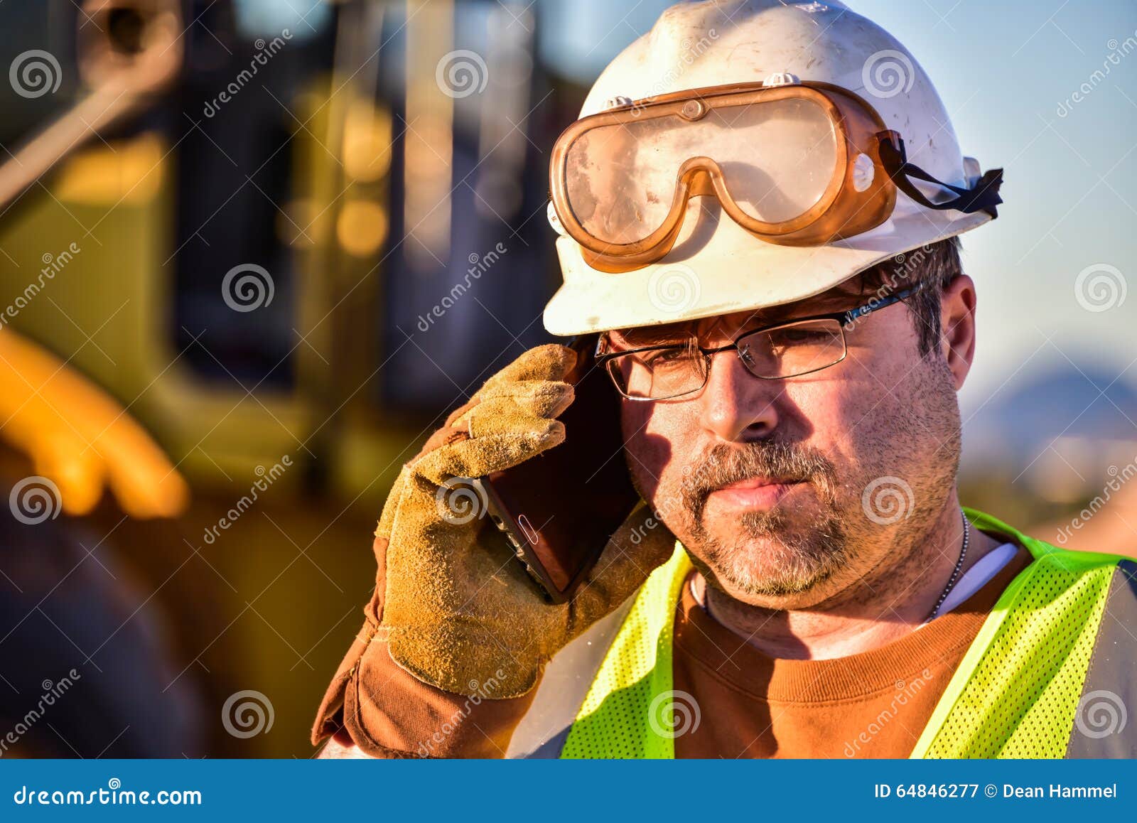 Construction Worker on Cell Phone Stock Image - Image of labor, morning ...