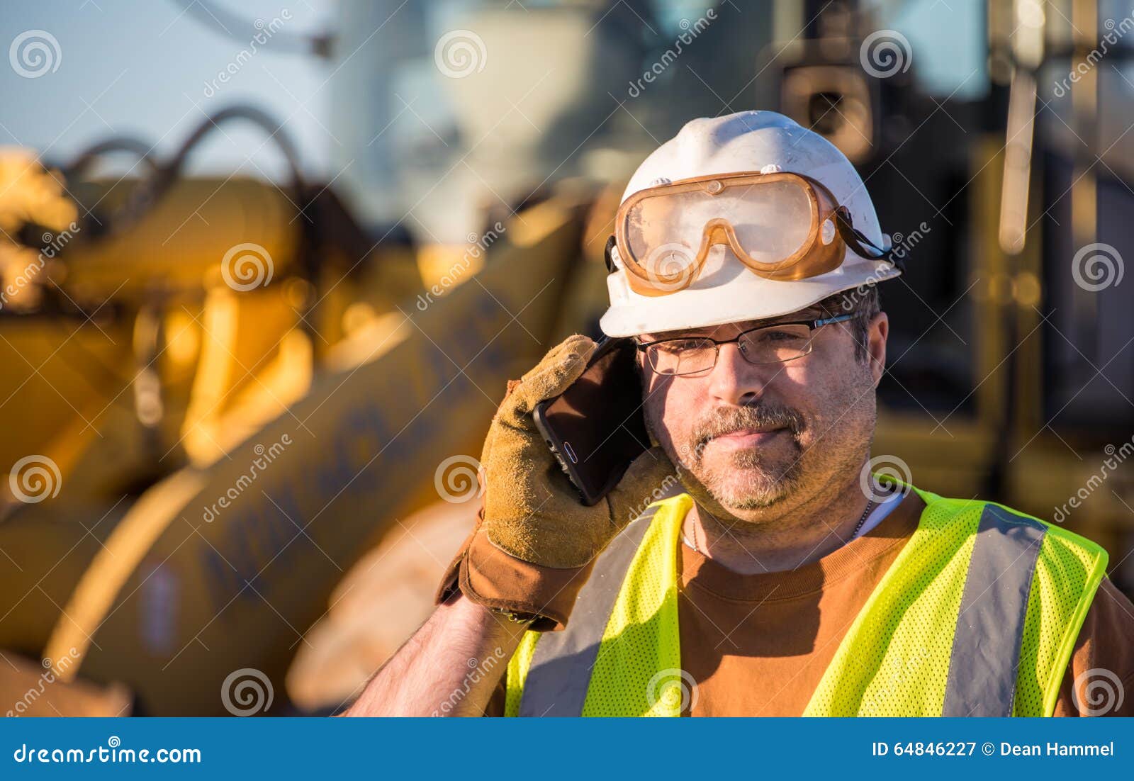 Construction Worker on Cell Phone Stock Image - Image of deere ...
