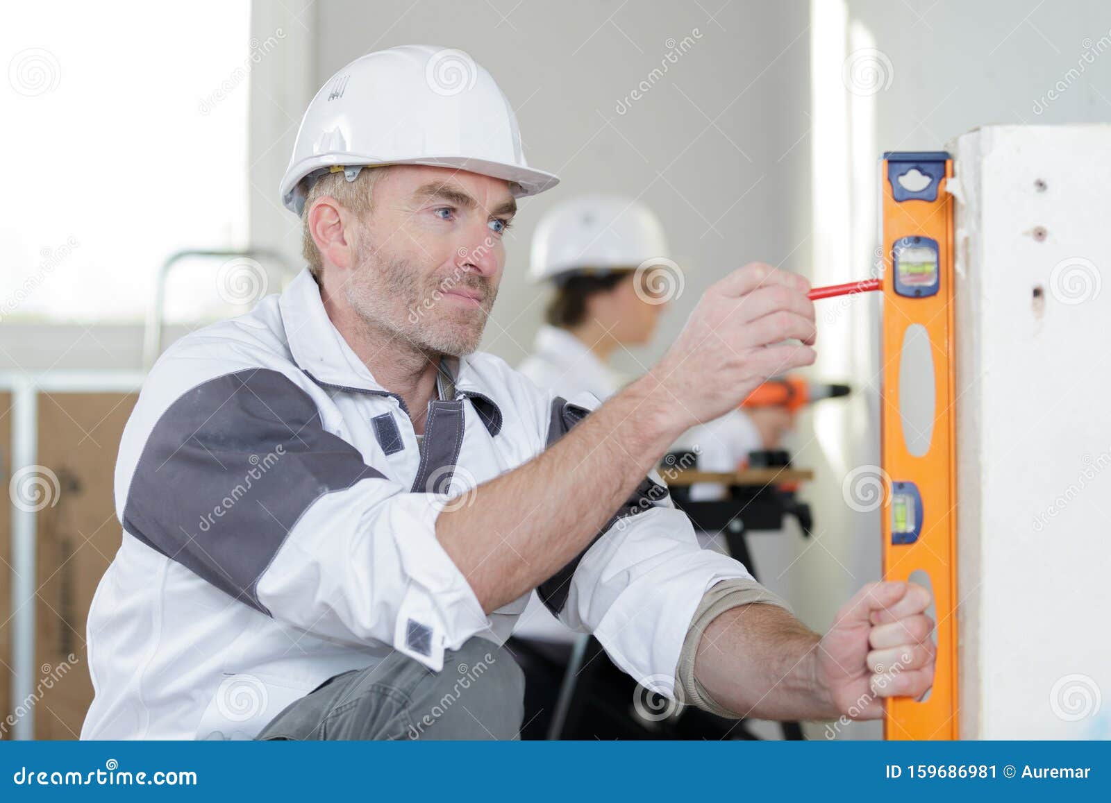 Construction Worker Check Level on Wall Stock Image - Image of builder ...