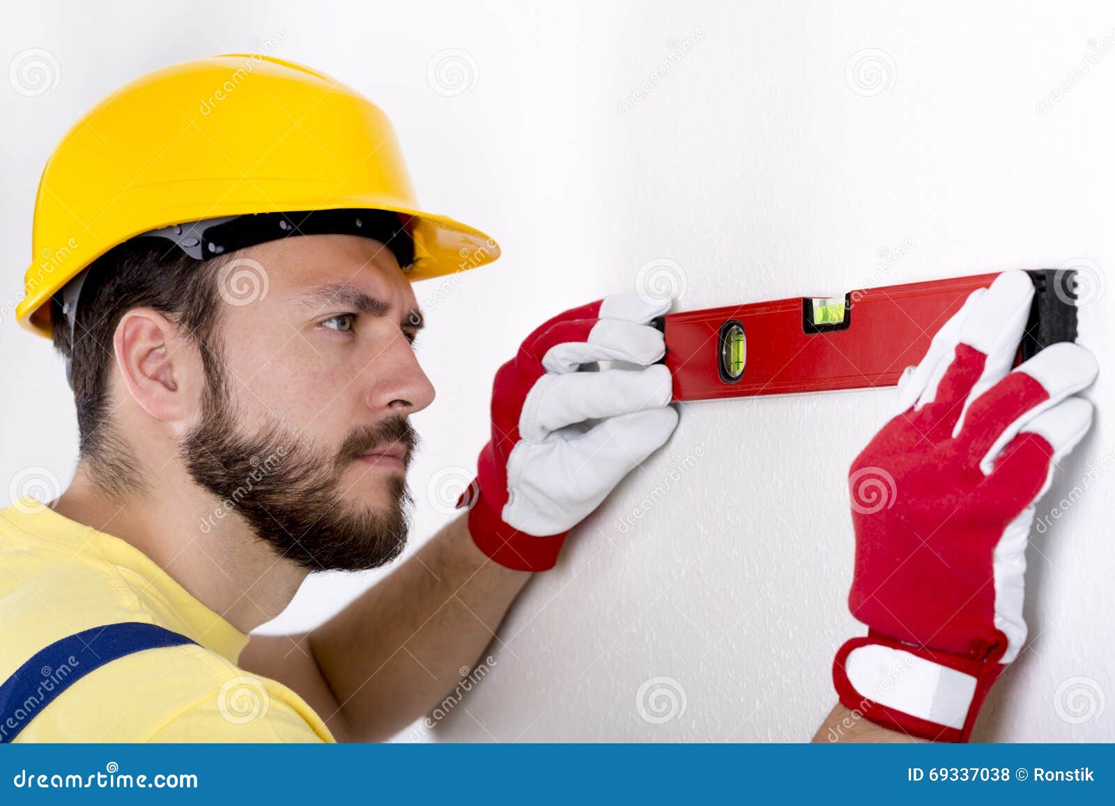 Construction Worker Check the Level on the Wall Stock Photo - Image of ...