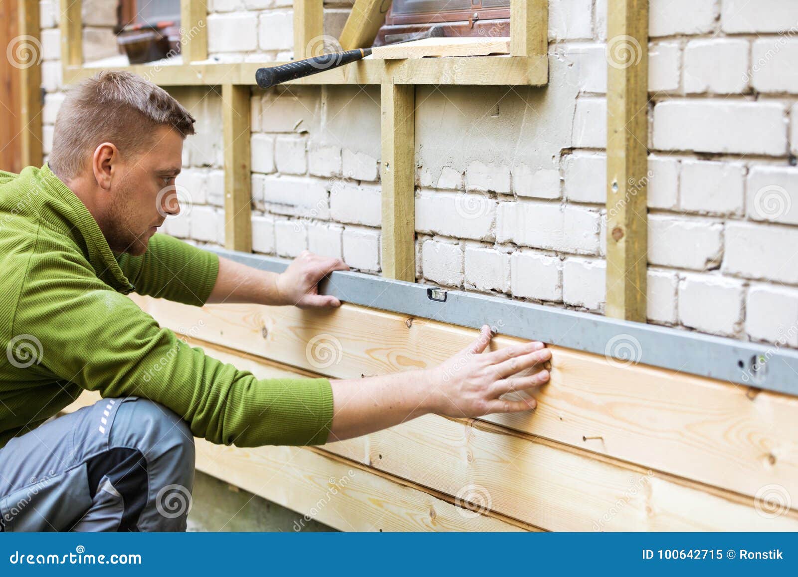 Construction Worker Checking Level of House Wood Facade Stock Image ...