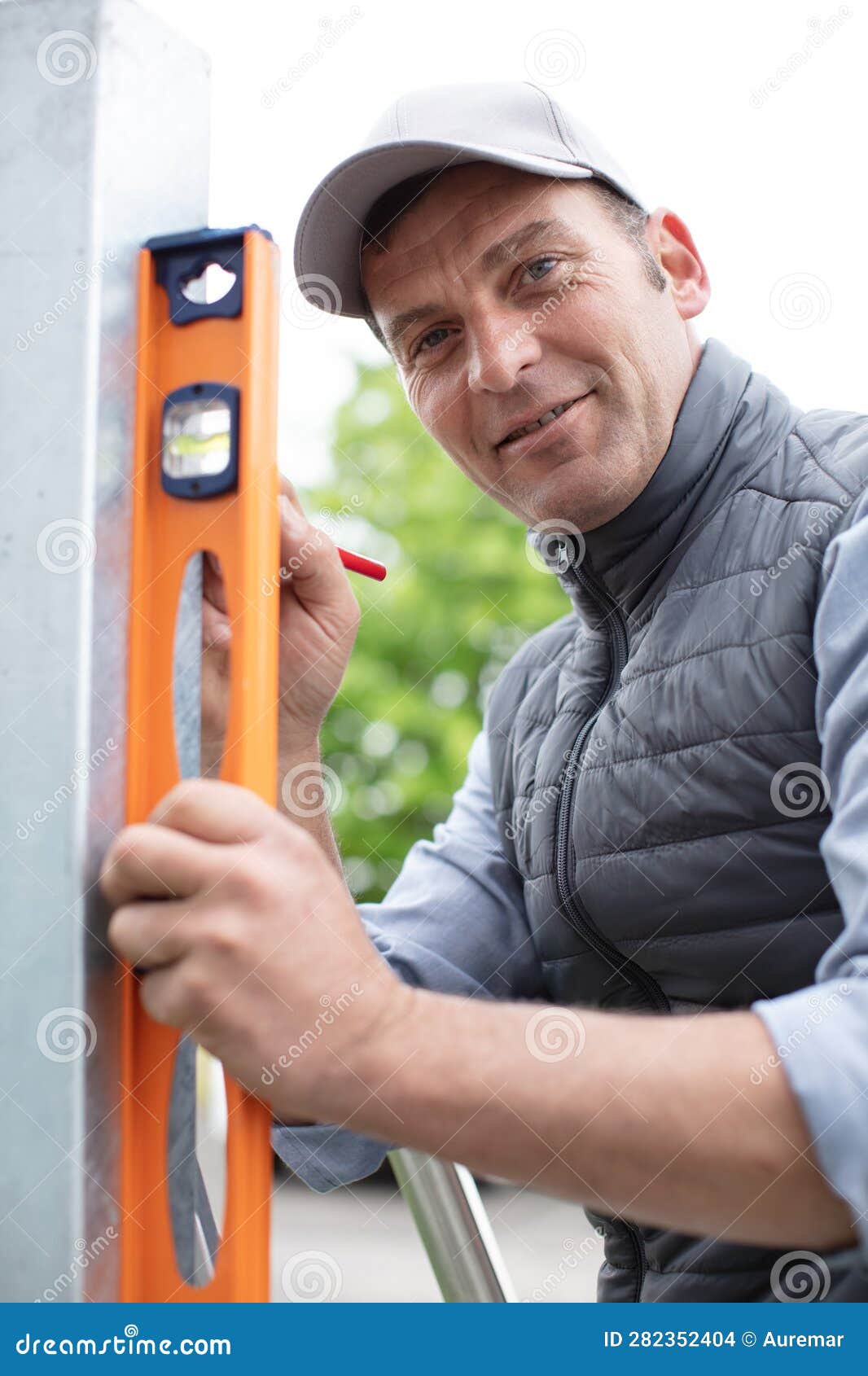 Construction Worker Checking Vertical Level with Measure Tool Stock ...