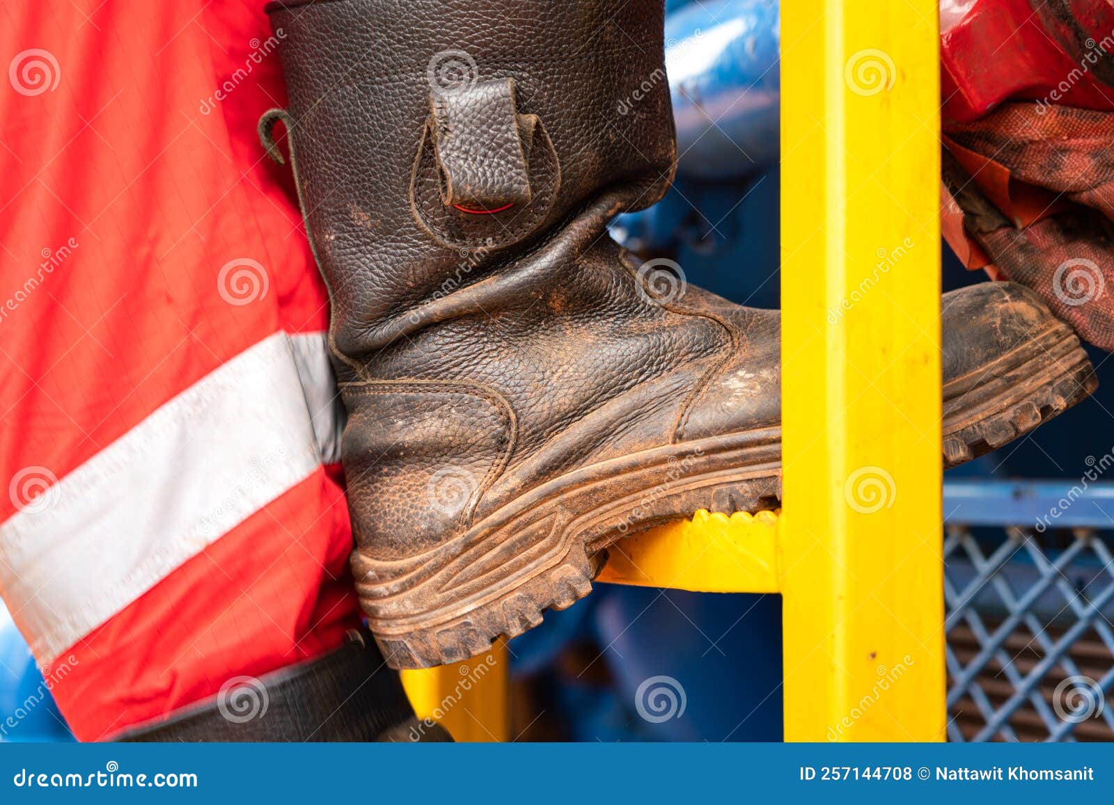 A Construction Worker is Climbing on the Platform Ladder. Stock Photo ...