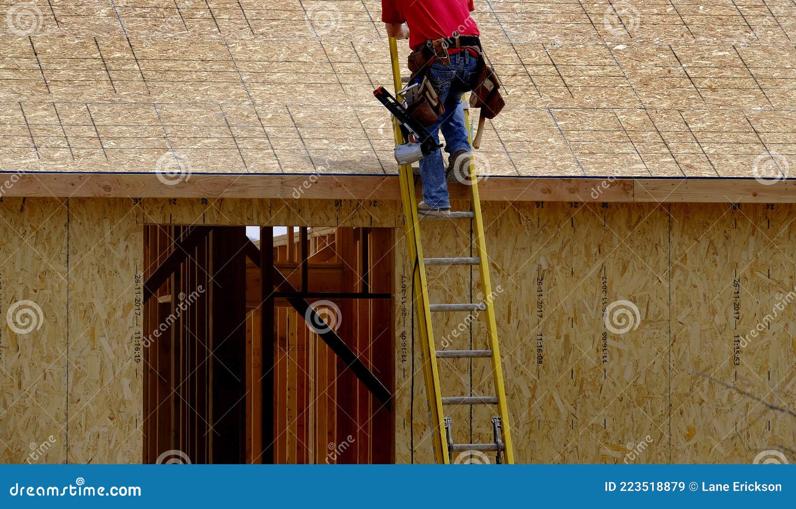 Construction Worker Climbing Up Ladder on Home Being Built Stock Image ...