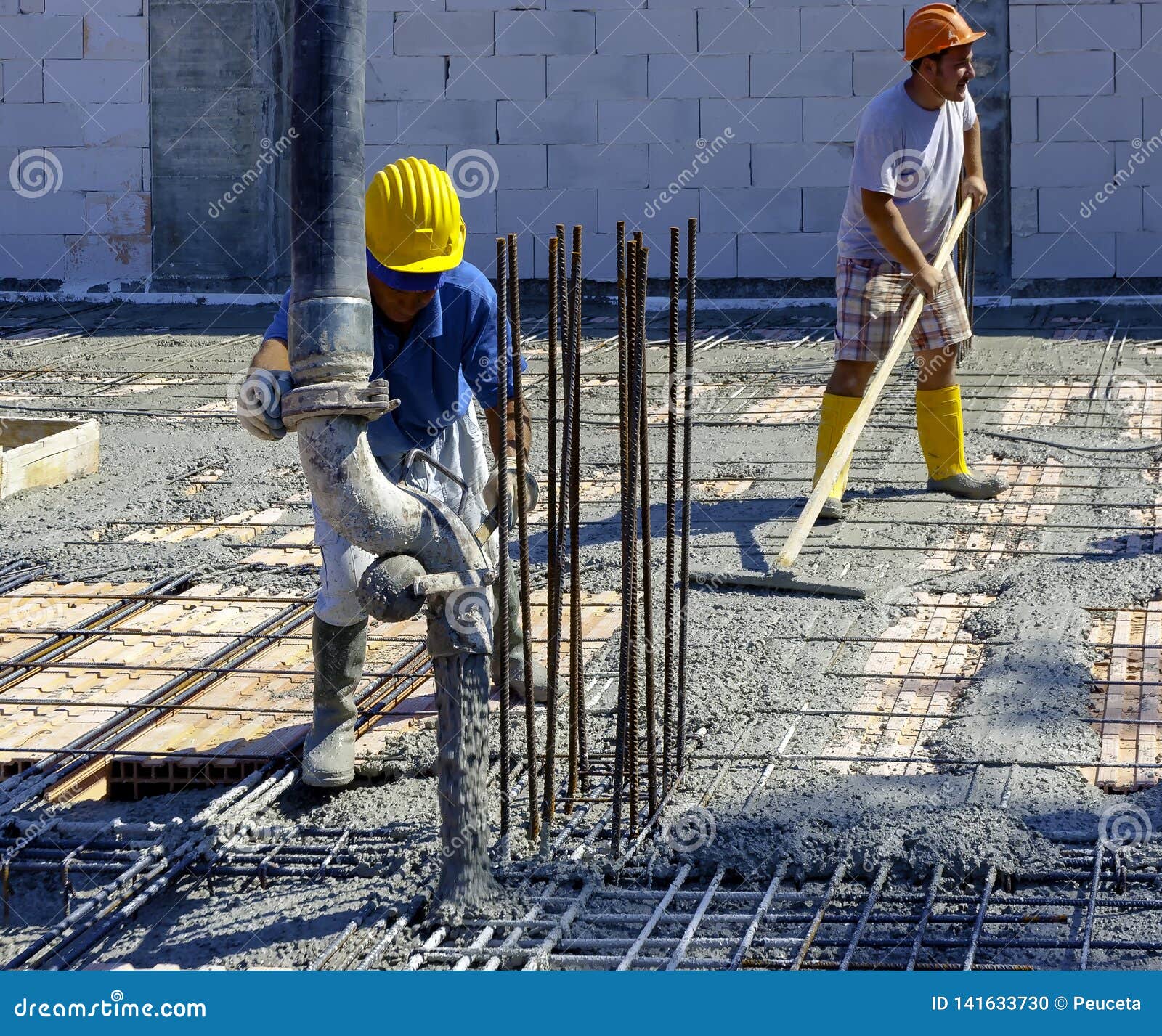 Worker Compacting Soil With Vibration Compaction Machine During ...