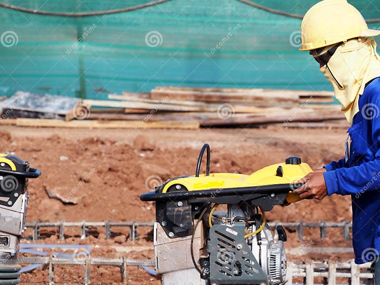Compacting Soil in House Foundation Using Stock Image - Image of ...