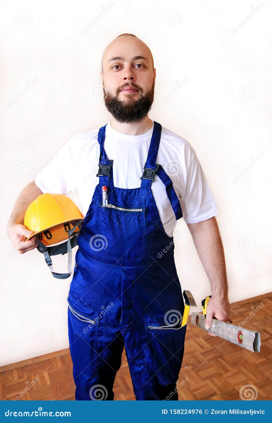 Construction Worker at Construction Site with Protective Uniform ...