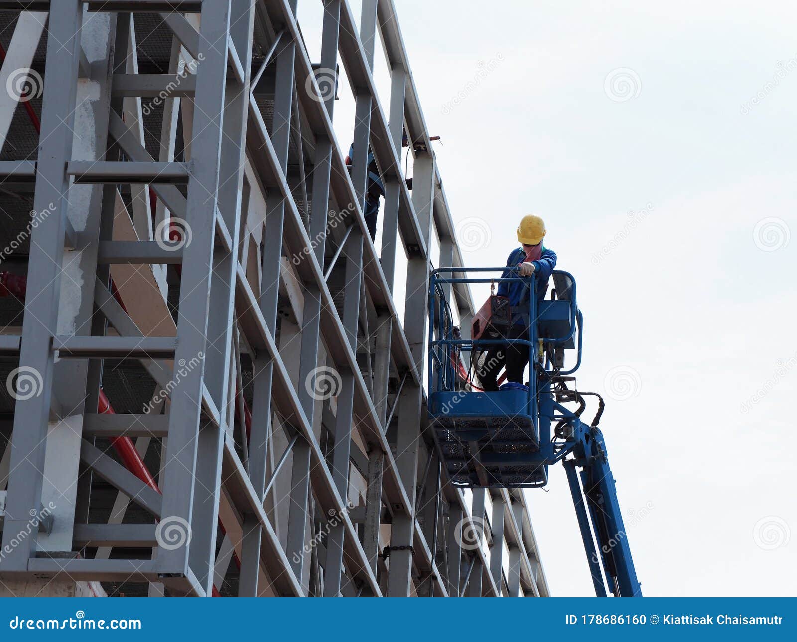 Man Working on the Working at Height on Construction Stock Photo ...
