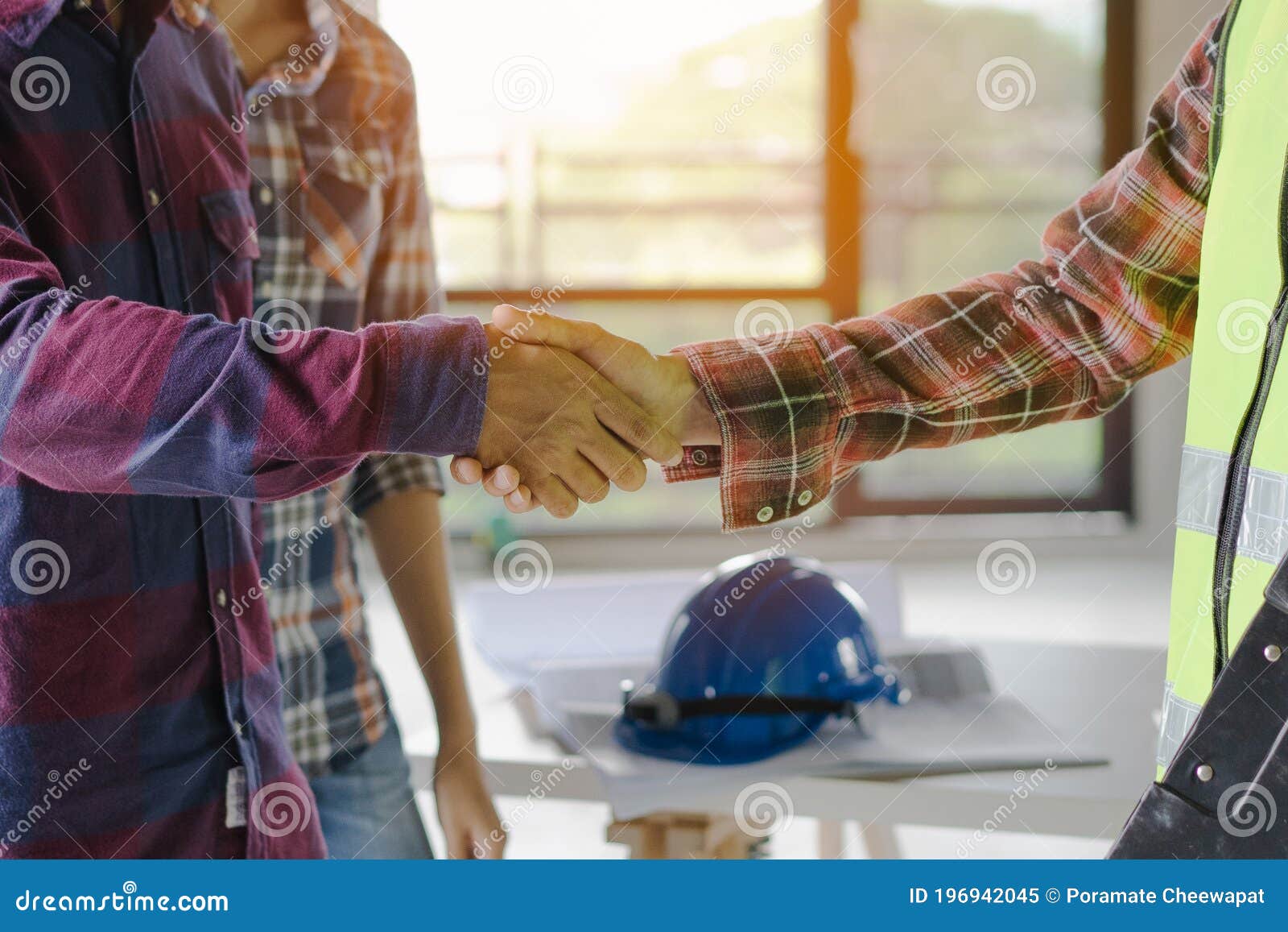Construction Worker and Contractor. Client Shaking Hands with Team ...
