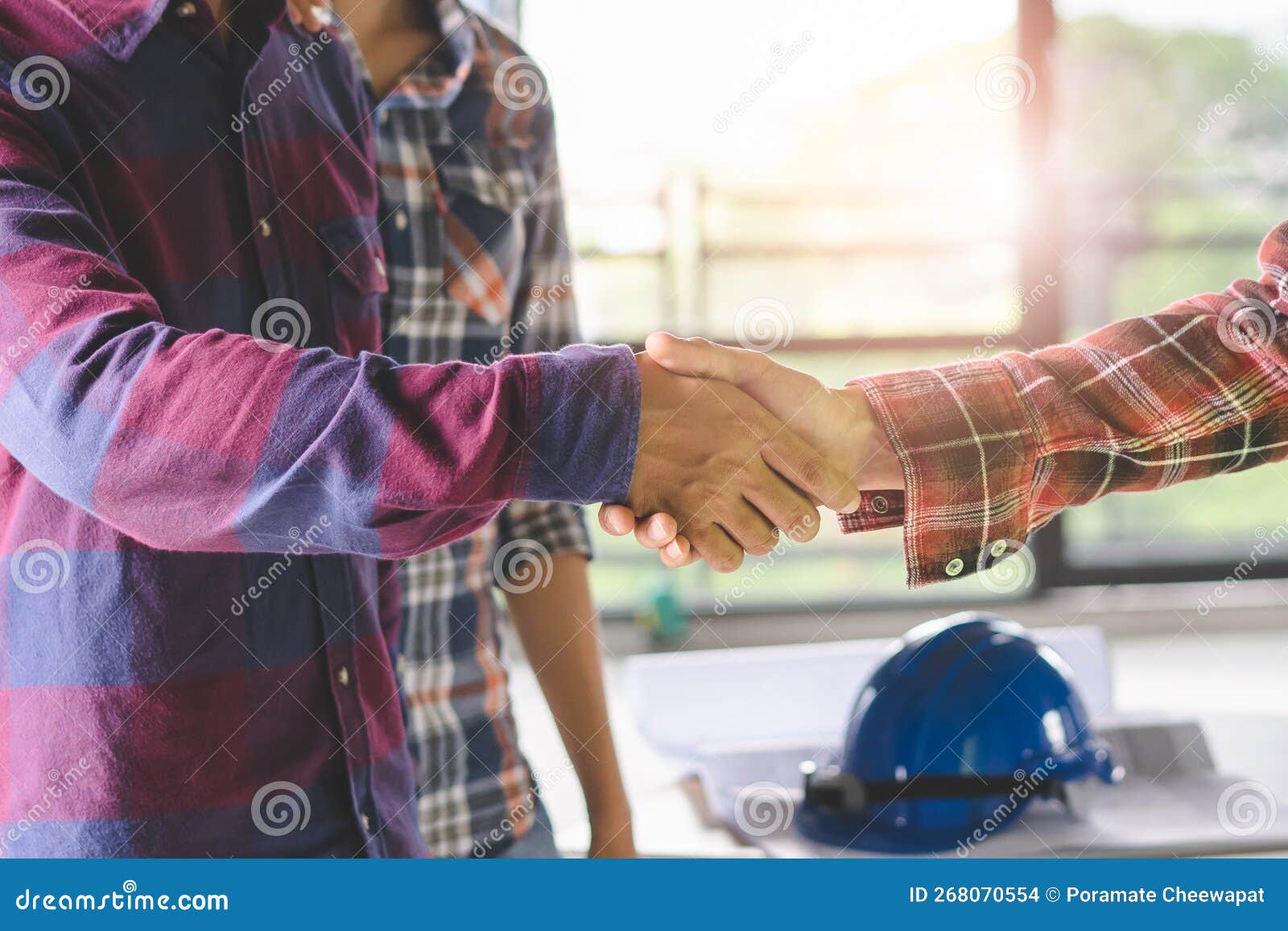 Client Shaking Hands with Team Builder in Renovation Site Stock Photo ...