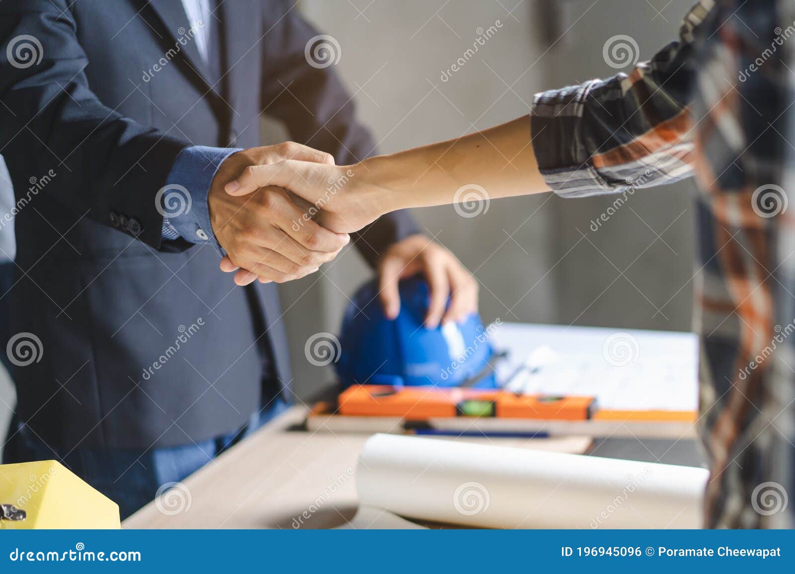 Client Shaking Hands with Team Builder in Renovation Site Stock Photo ...