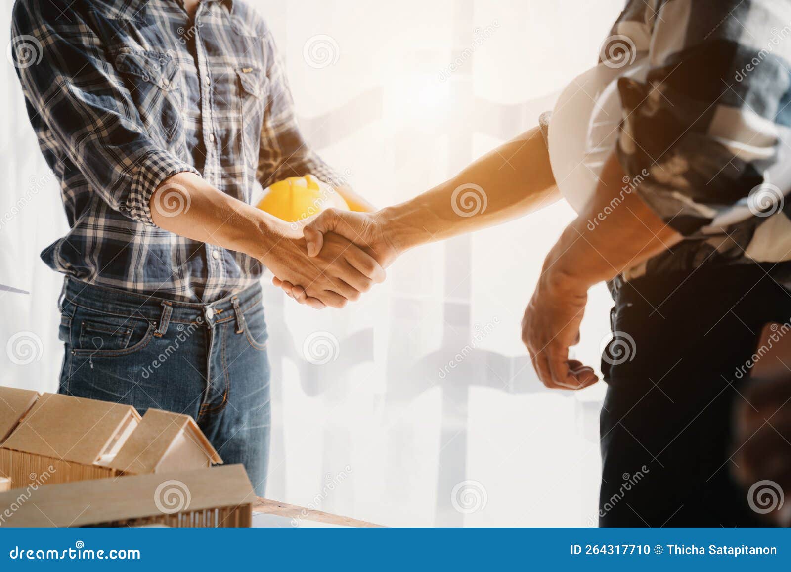 Construction Worker and Contractor. Client Shaking Hands with Team ...
