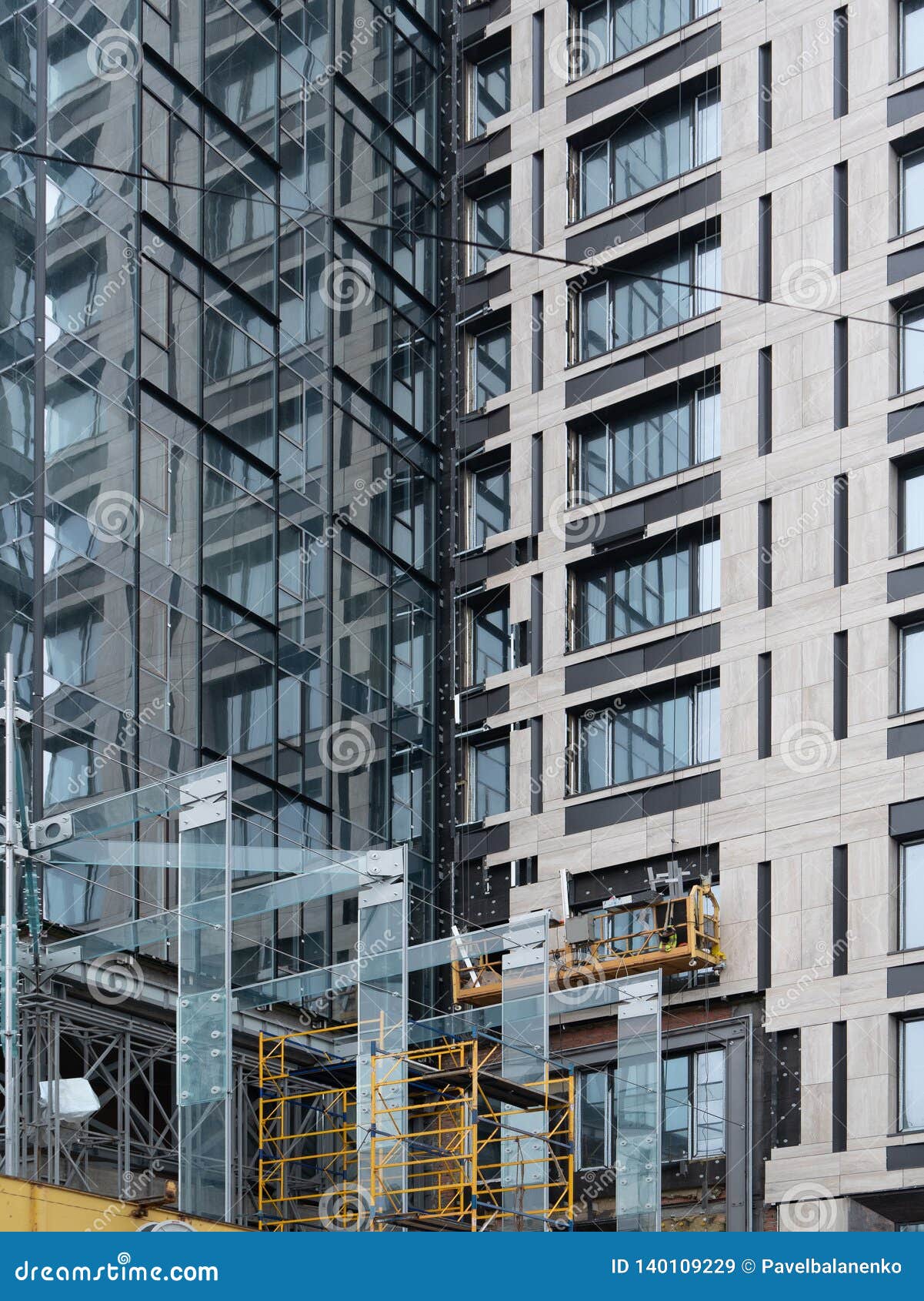 Construction Worker Cradle for Cleaning Windows on Skyscraper Stock ...