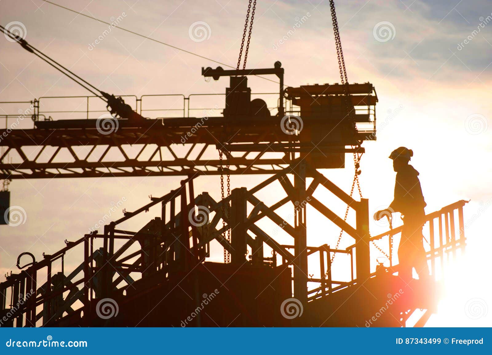 Construction Worker, Crane and Building at Sunset Stock Image - Image ...