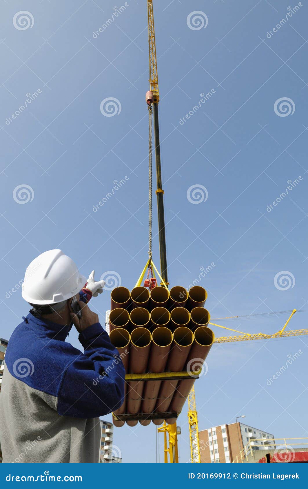Construction Worker and Crane Load Stock Photo - Image of crane ...
