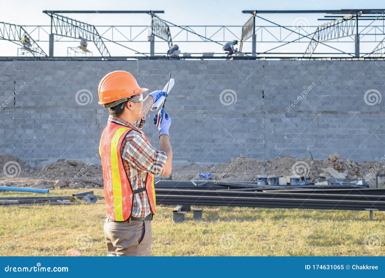 A Construction Worker Currently Ordering Workers Site Area with Radio ...