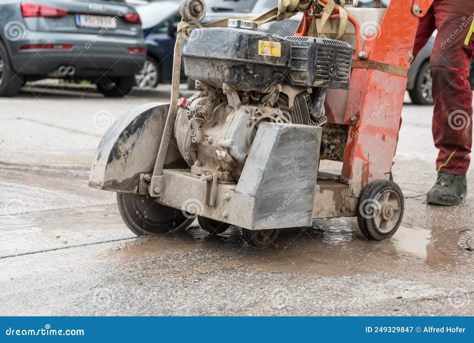 Construction Worker with Asphalt Cutter - Construction Machine Stock ...