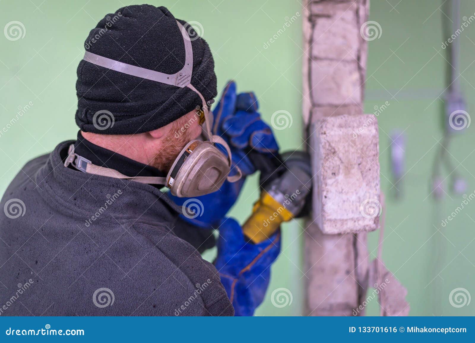 Construction Worker Cutting Concrete Wall by Using Electric Cutter ...