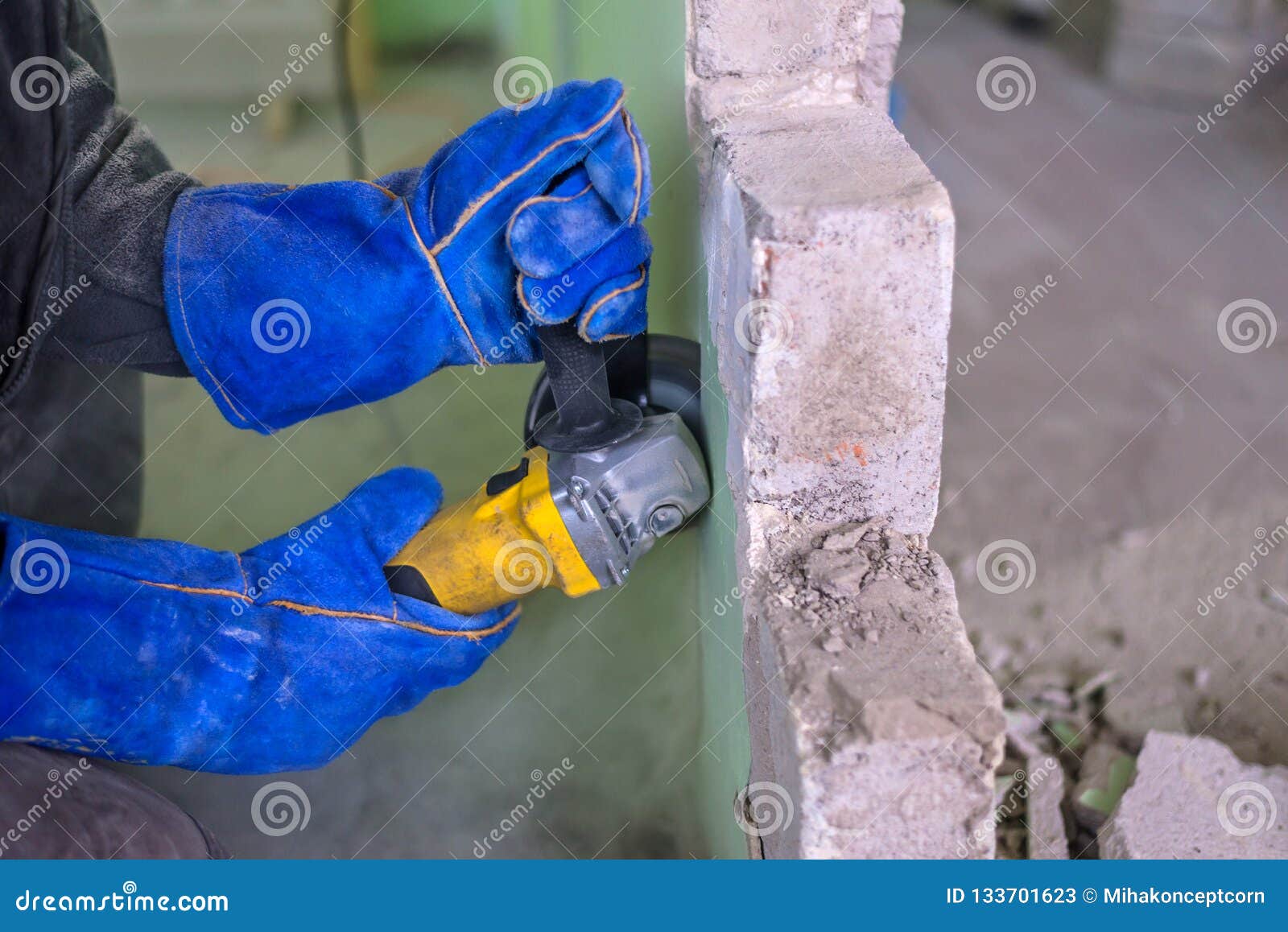 Construction Worker Cutting Concrete Wall by Using Electric Cutter ...