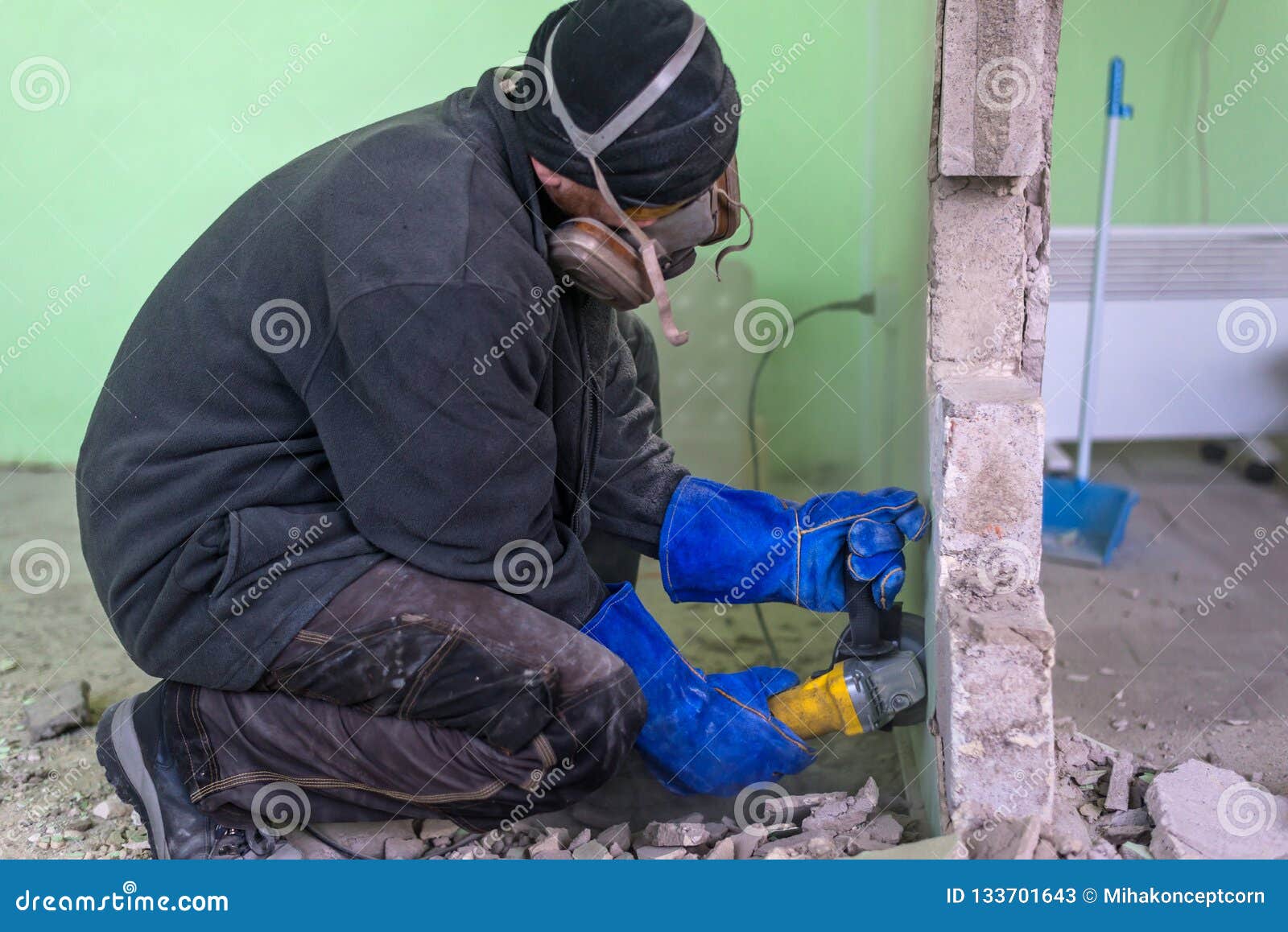 Construction Worker Cutting Concrete Wall by Using Electric Cutter ...