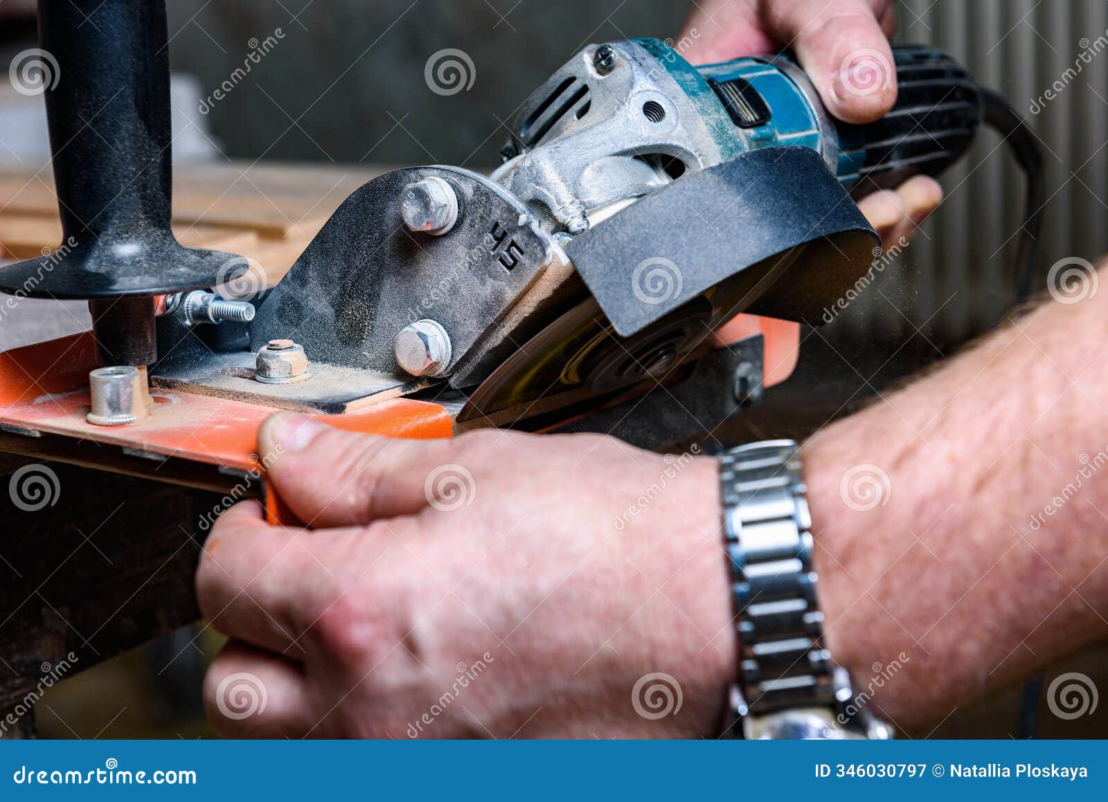 Construction Worker Cutting Laminate Using Angle Grinder with Stand for ...