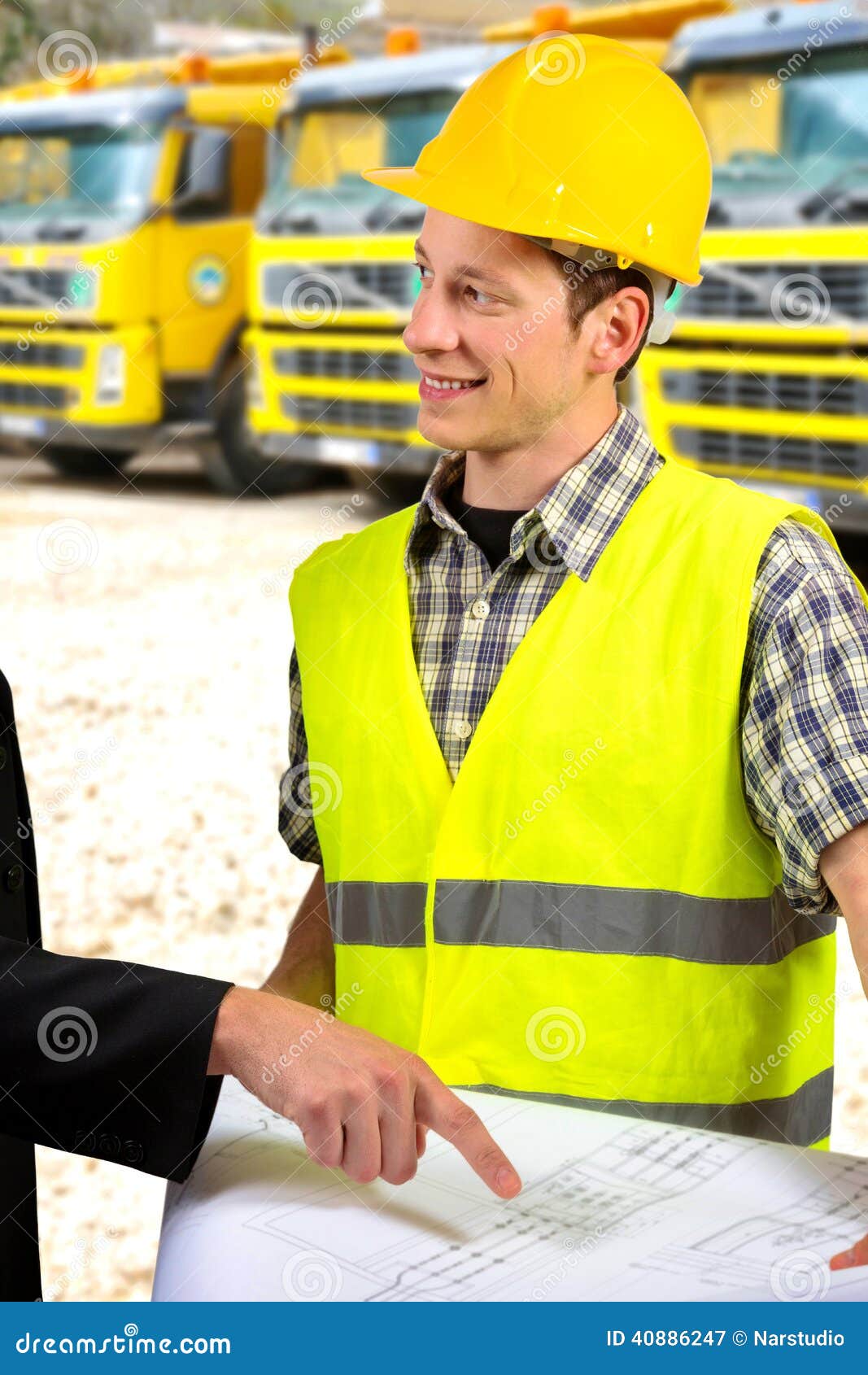 Construction Worker Discussing Project Documents Stock Image - Image of ...