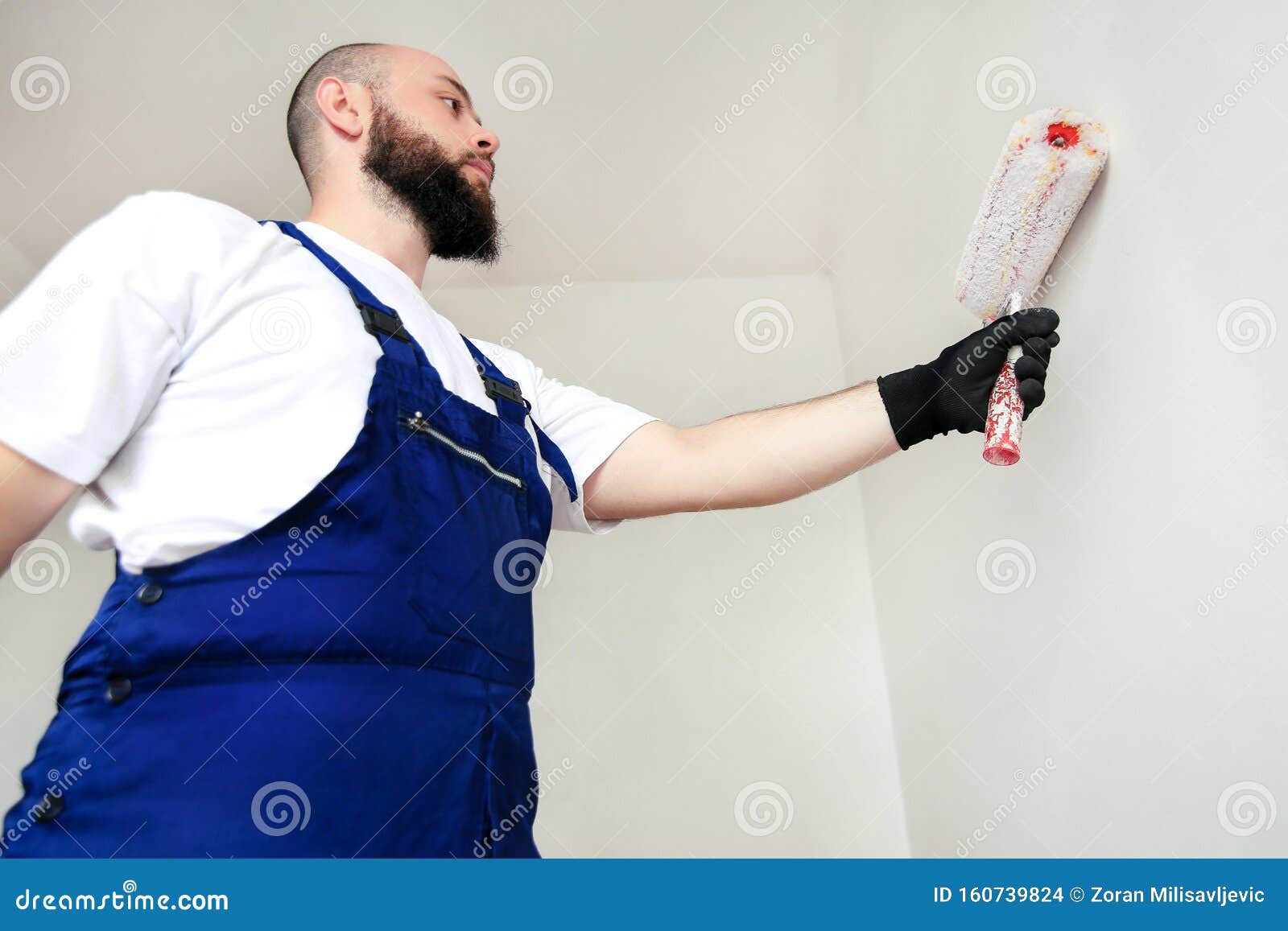 Construction Worker Doing Finish Renovation at Apartment. Professional ...